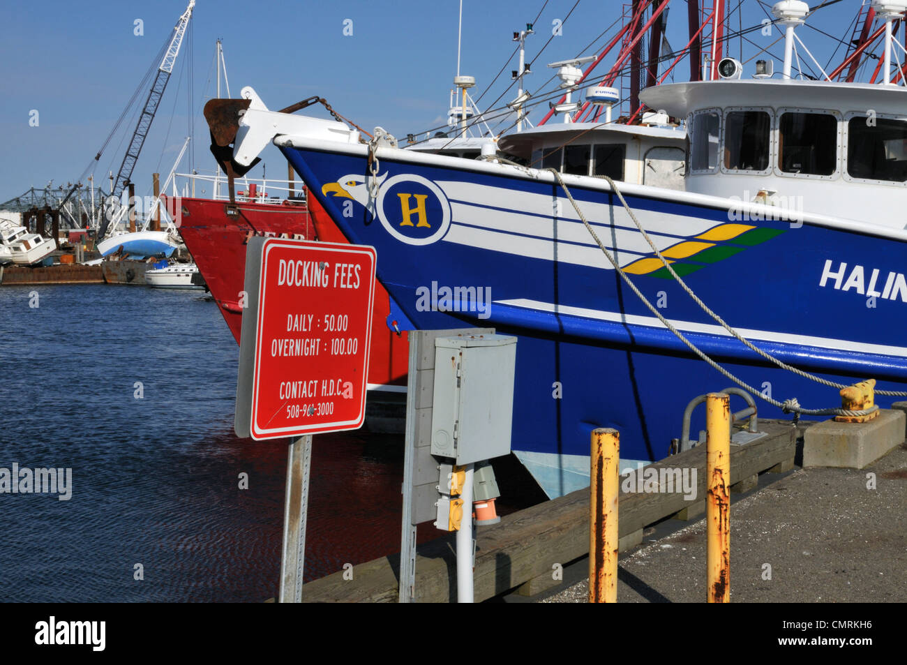 Docking fee sign on the fishing fleet's wharf in New Bedford Harbor ...