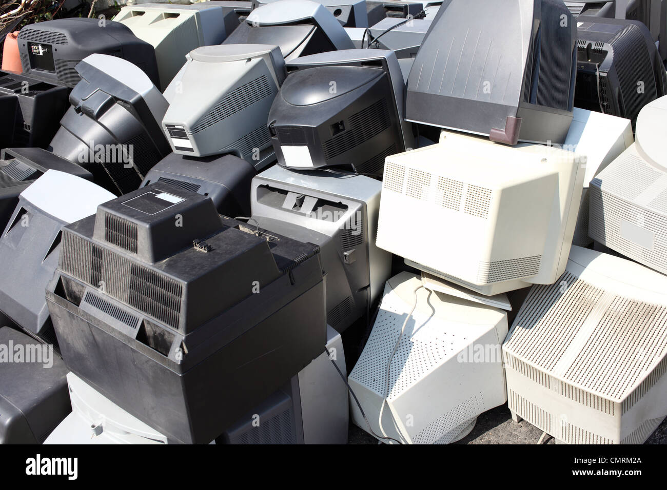 Old broken computers monitors Stock Photo - Alamy