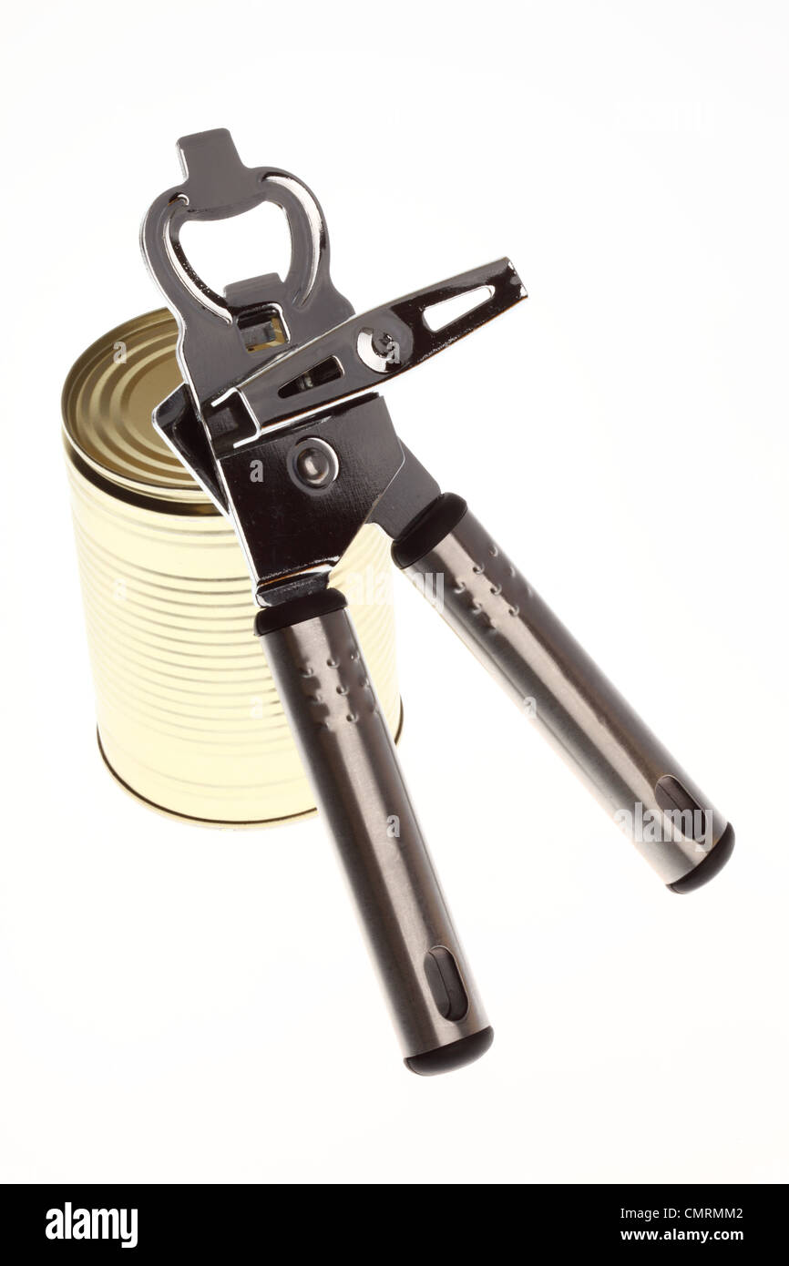 Tin opener opening a can of food isolated on white Stock Photo - Alamy