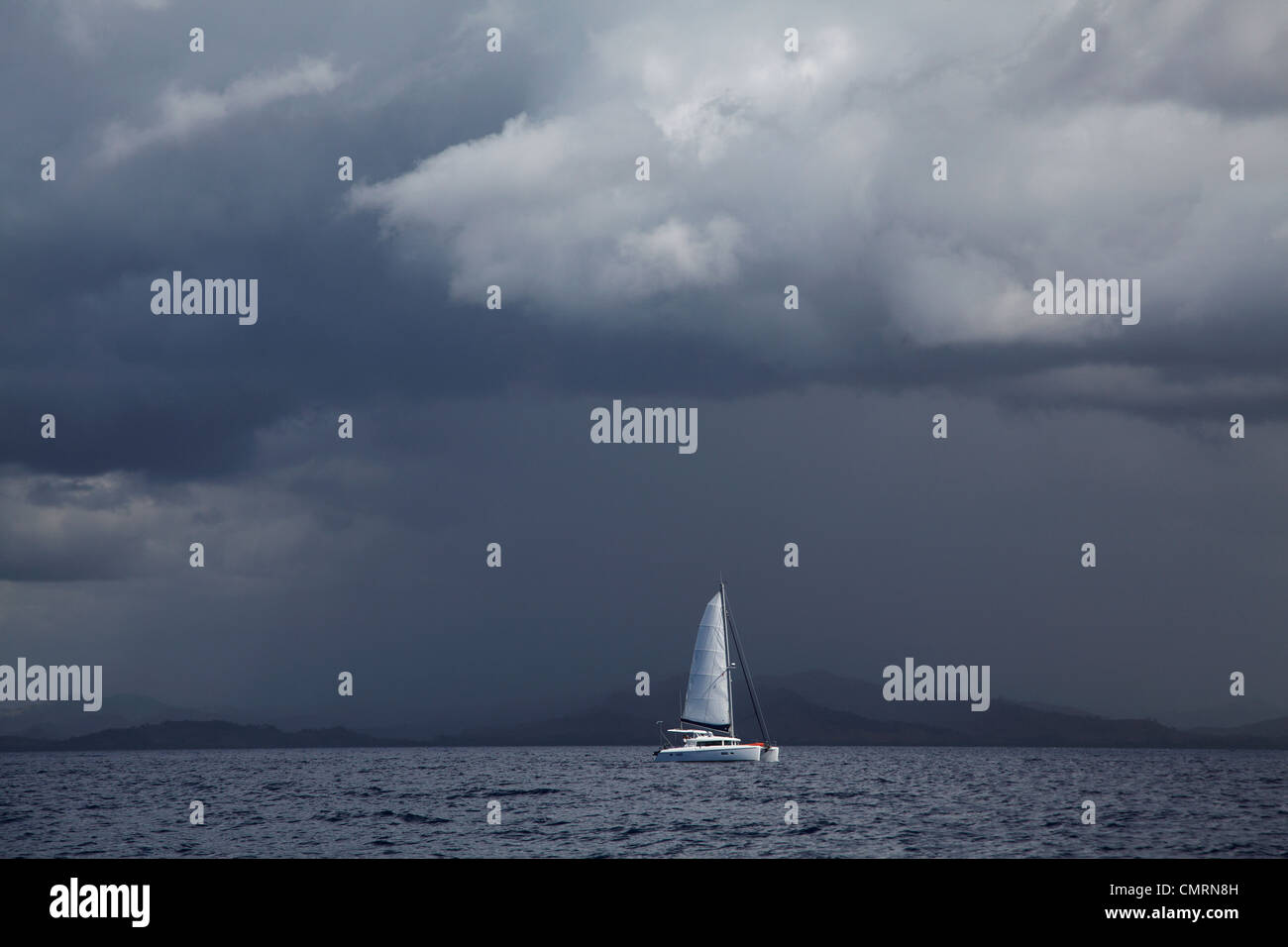 Yacht and rain storm over Nadi area, Viti Levu, Fiji, South Pacific ...