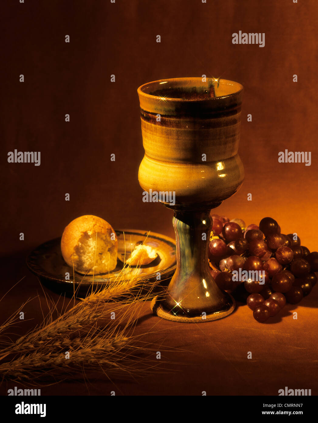 WHEAT CUP GRAPES AND BREAD Stock Photo - Alamy