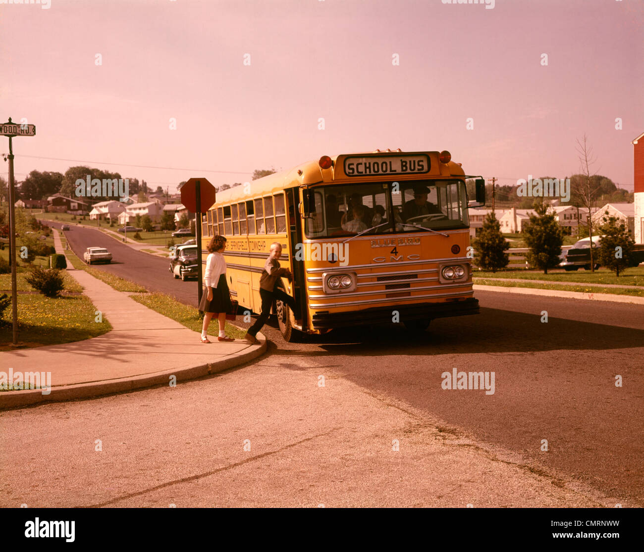 1960 1960s BOY GIRL SUBURBAN COMMUNITY STREET GETTING INTO YELLOW ...
