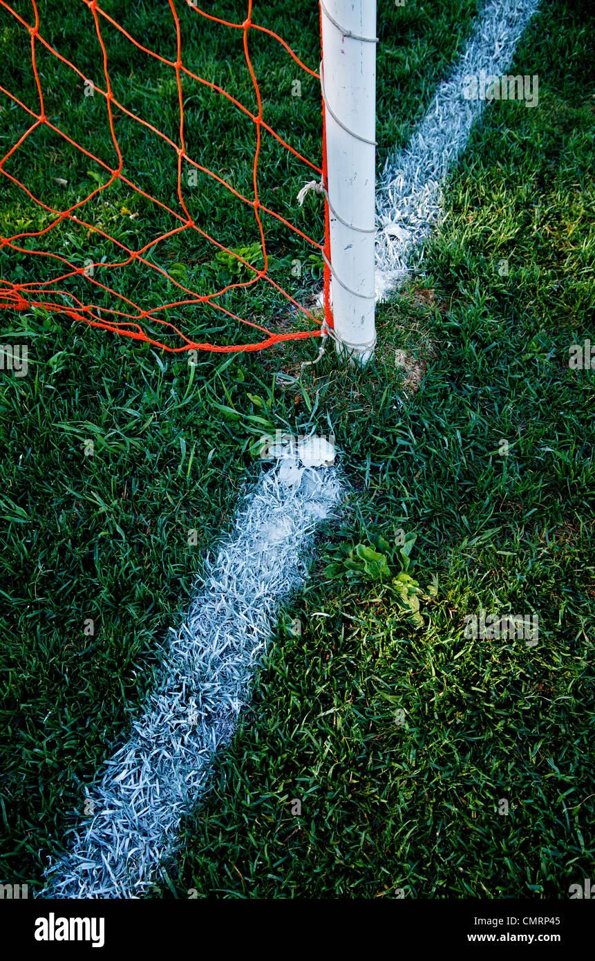 Soccer goalpost with white chalk line and orange net, Otterburn park ...