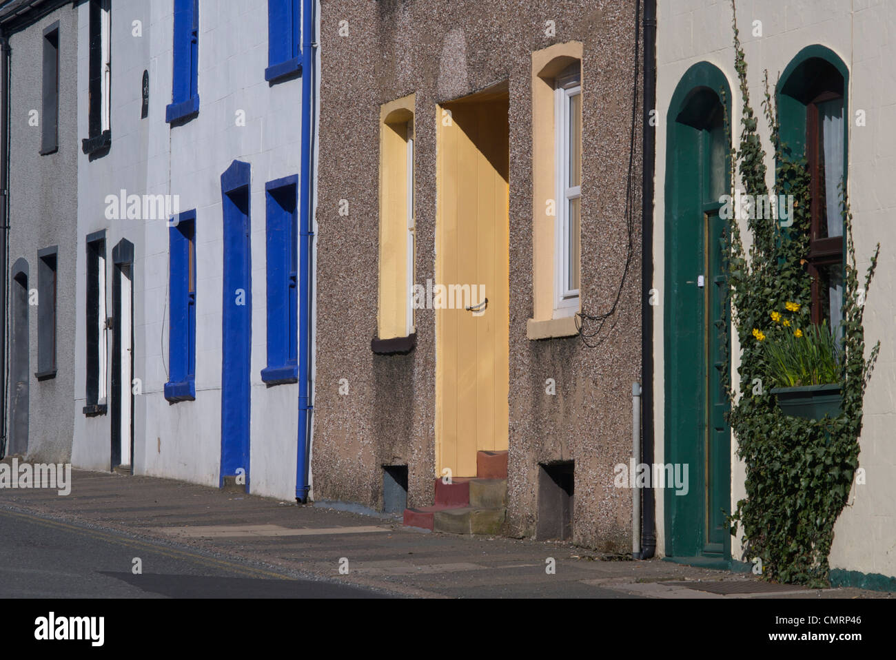 Colourful terraced houses on Soutergate, Ulverston, Cumbria, England UK ...