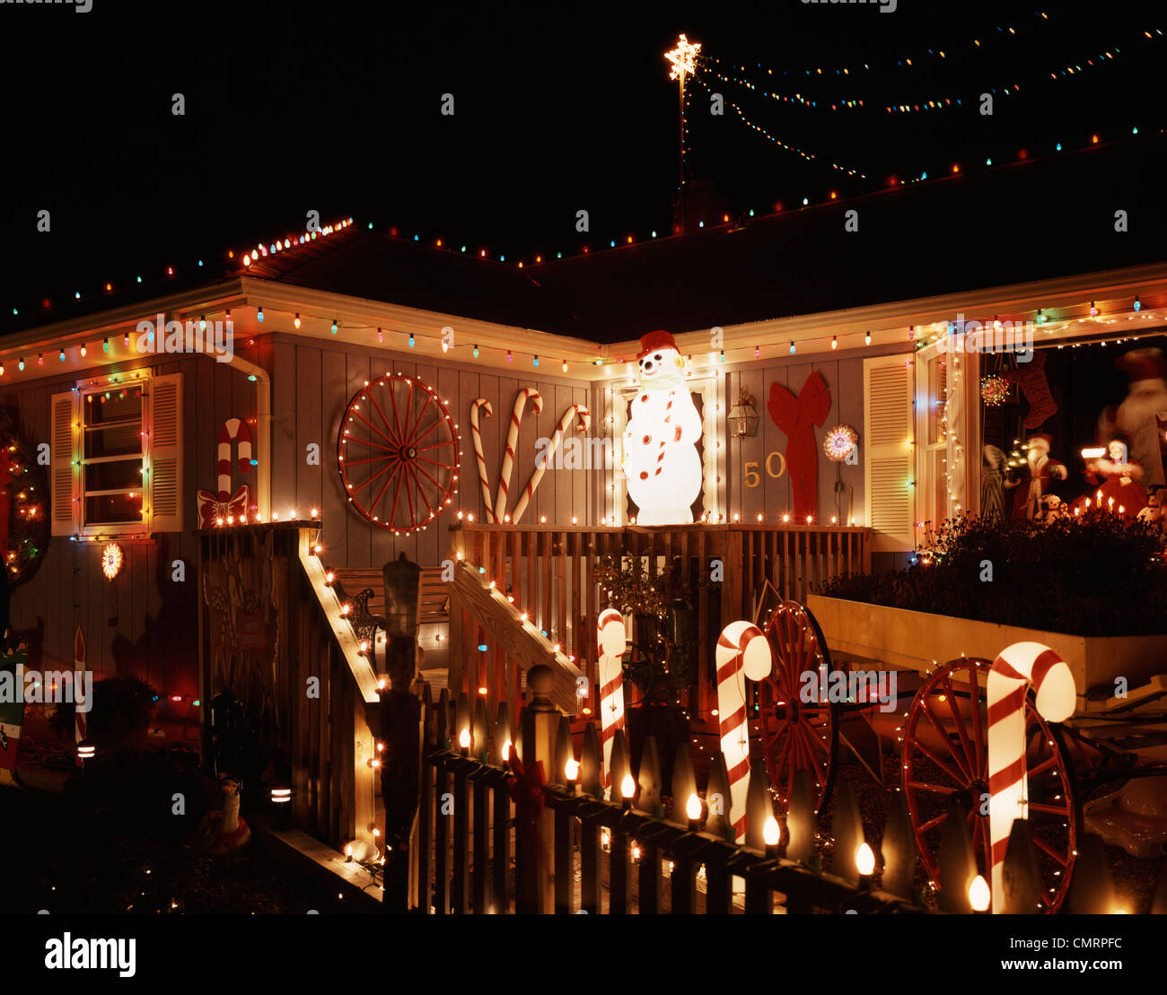 1990s ELABORATE CHRISTMAS LIGHTING AND DECORATION AROUND RANCH HOUSE ...