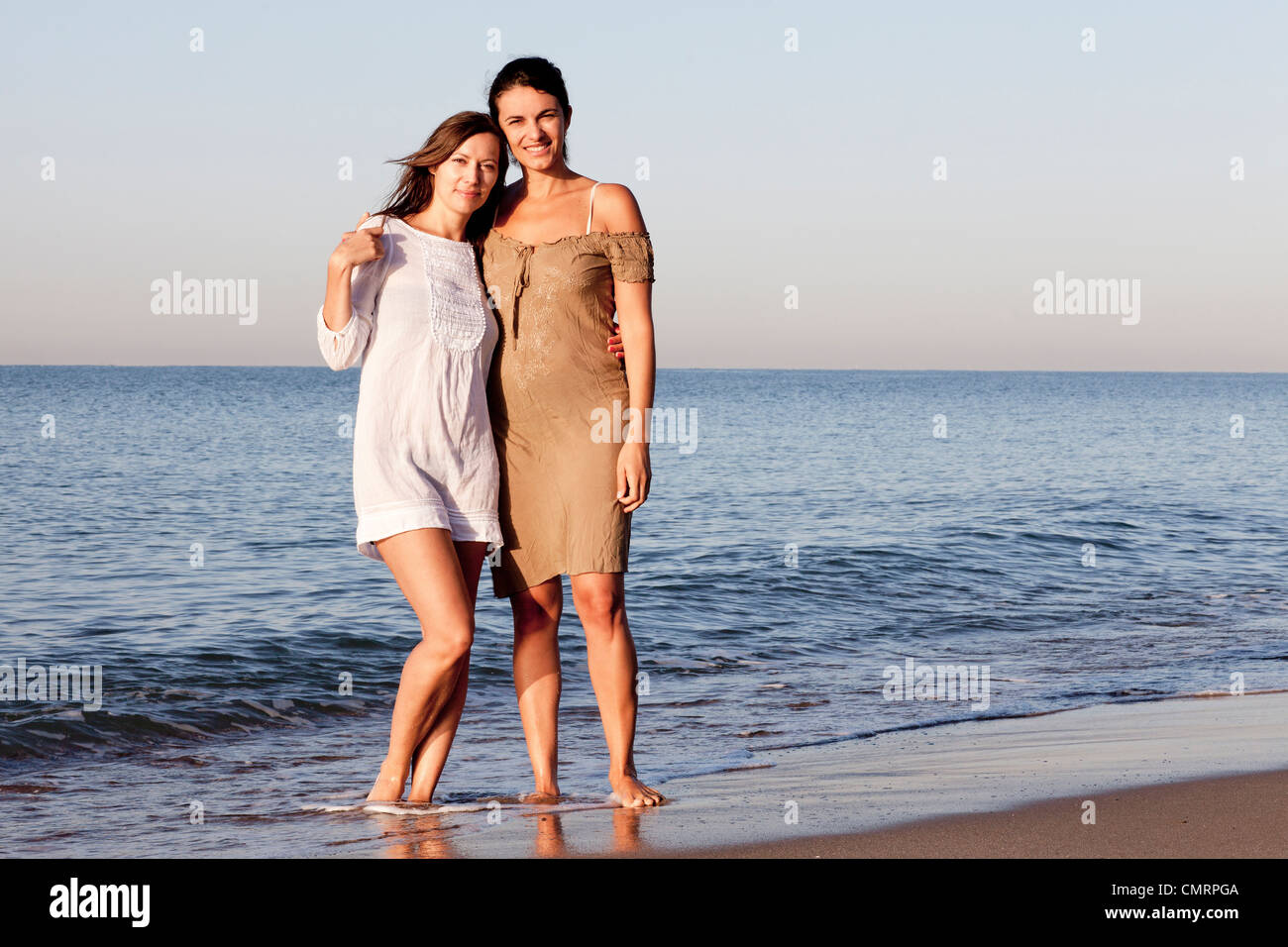 Two women happy Stock Photo - Alamy