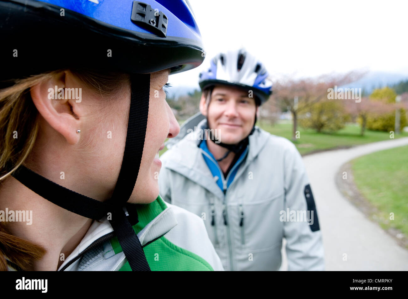 Woman Looking back at Man Riding Tandem Bike, Vancouver, British ...
