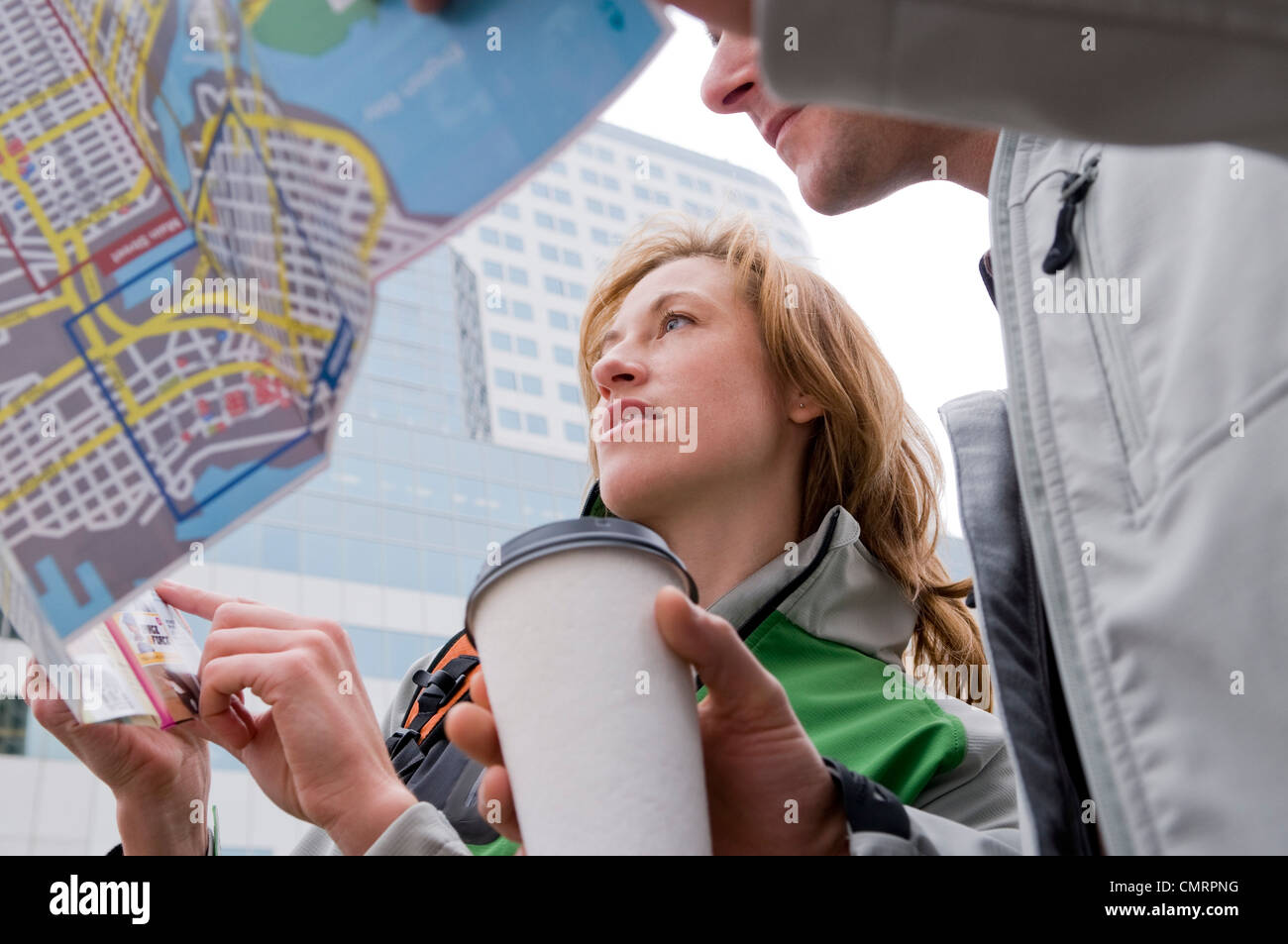 Couple Reading a Map and Looking for Directions, Vancouver, British ...