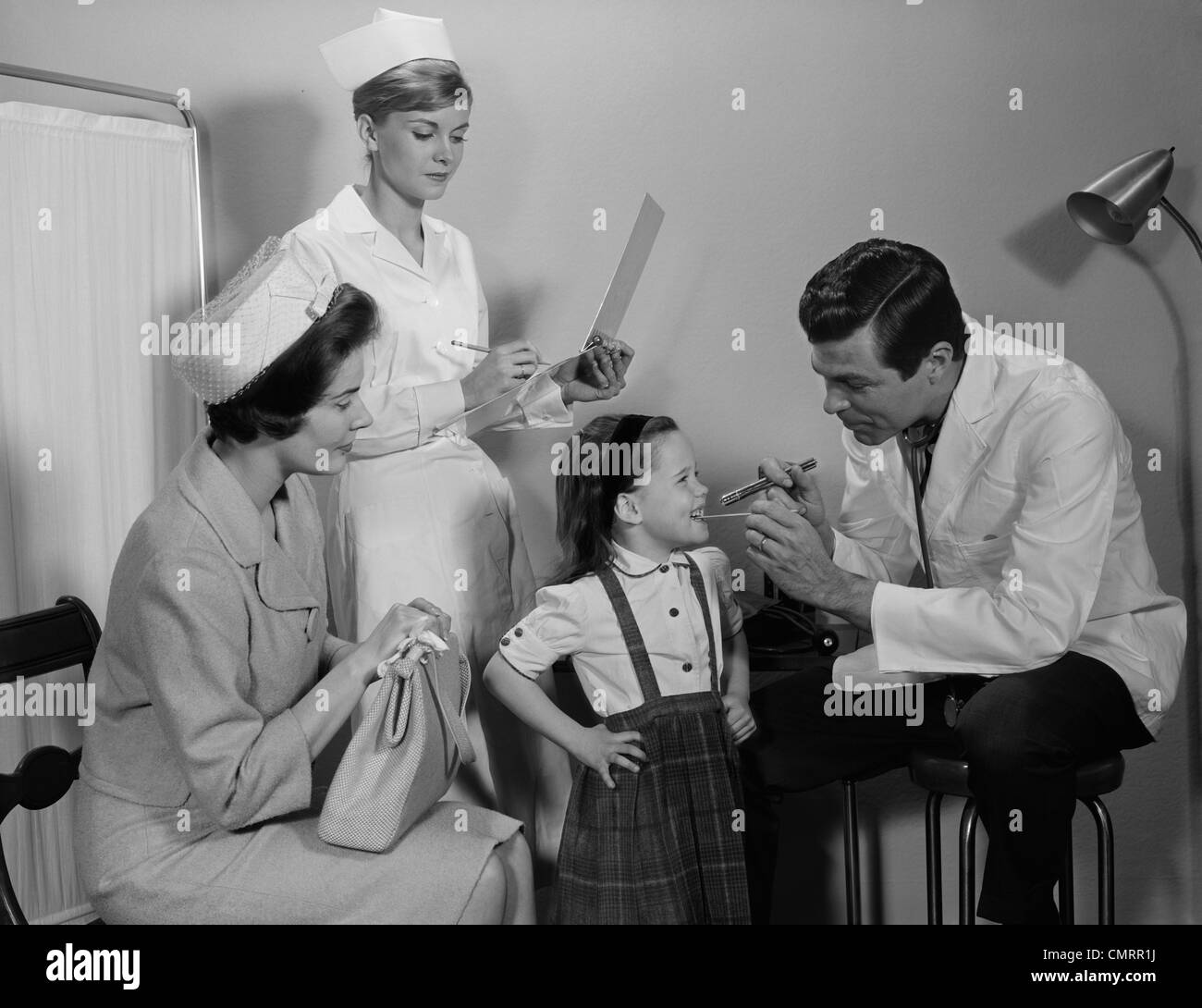 Family doctor with kid vintage Black and White Stock Photos & Images ...