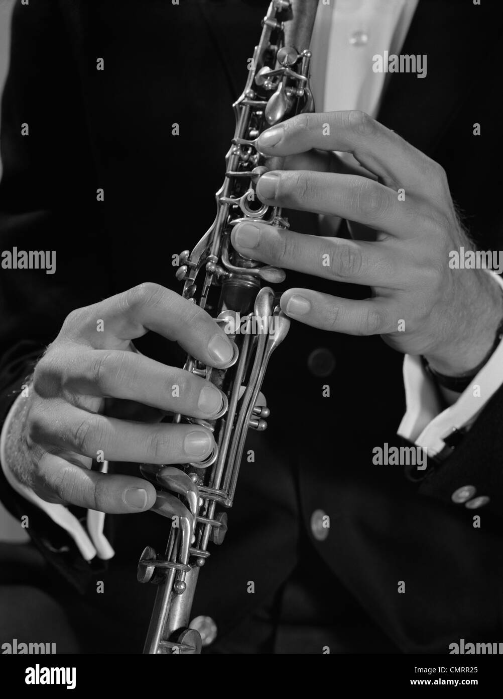 Woodwind instrument playing Black and White Stock Photos & Images - Alamy