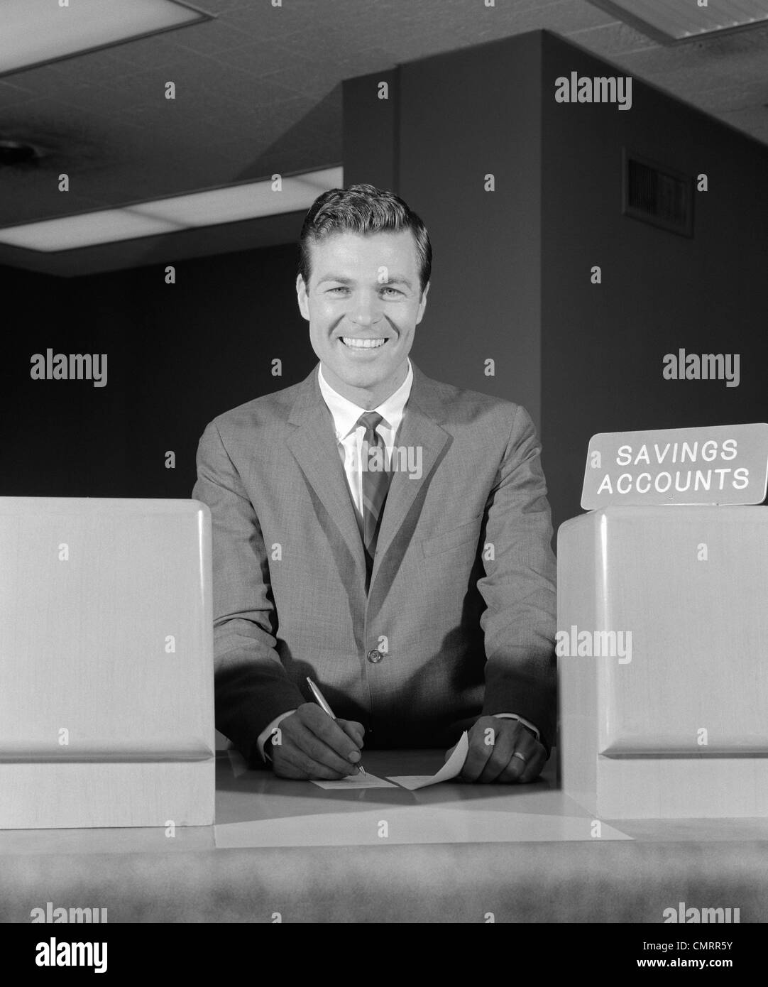 Bank teller Black and White Stock Photos & Images - Alamy