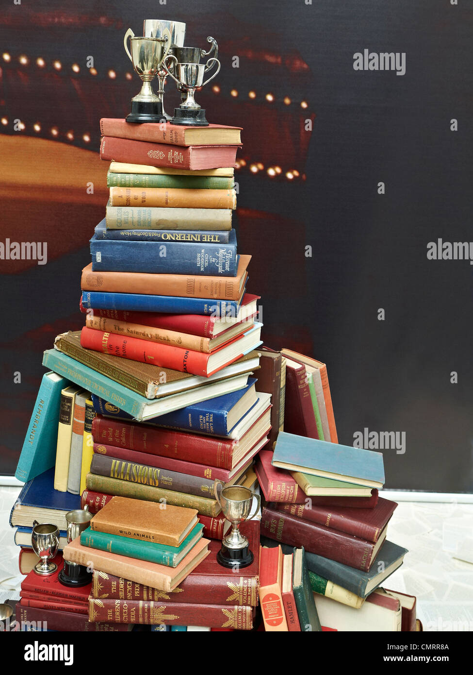 Stack of old books window display Stock Photo - Alamy