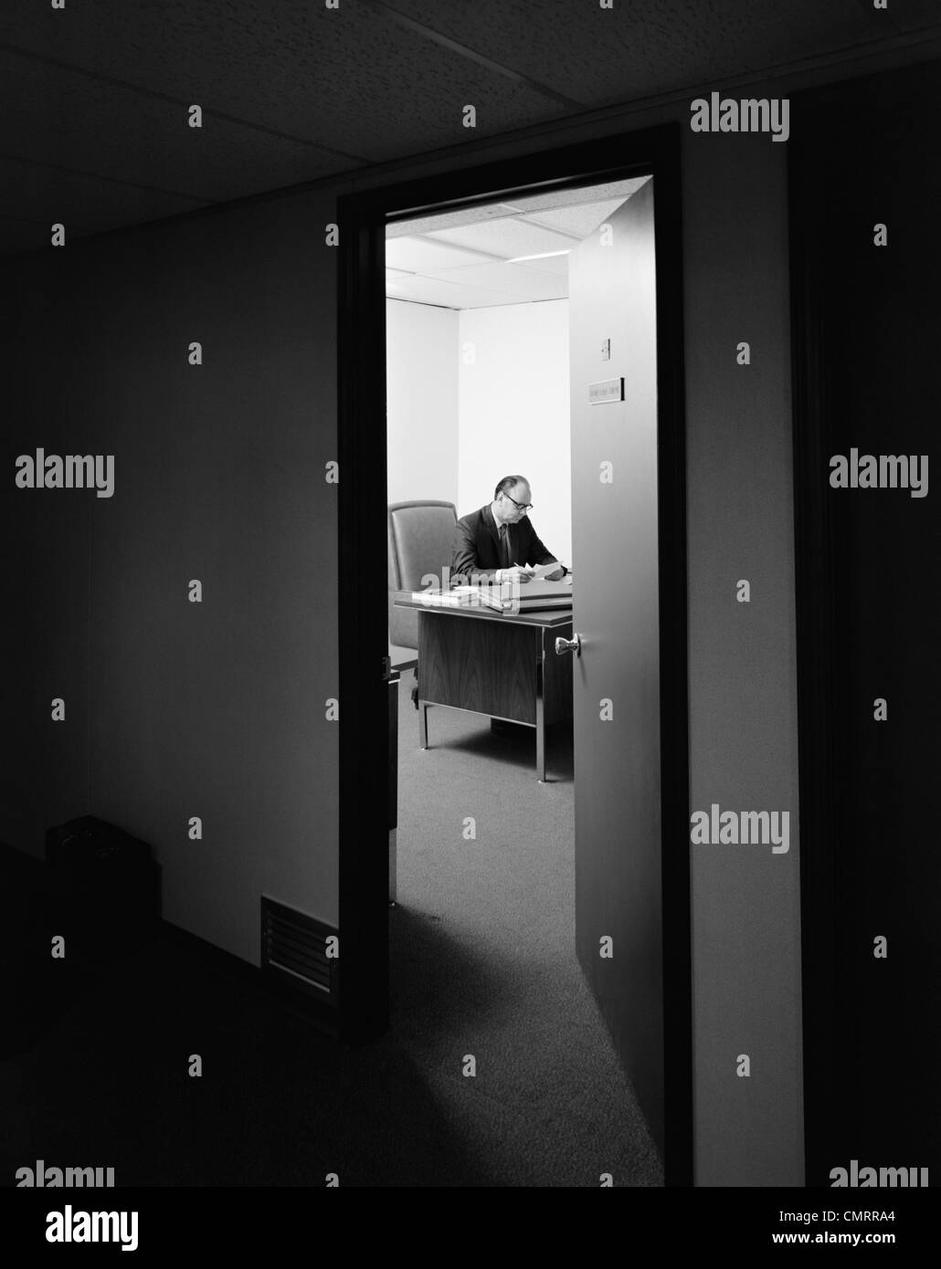 Dark man desk Black and White Stock Photos & Images - Alamy