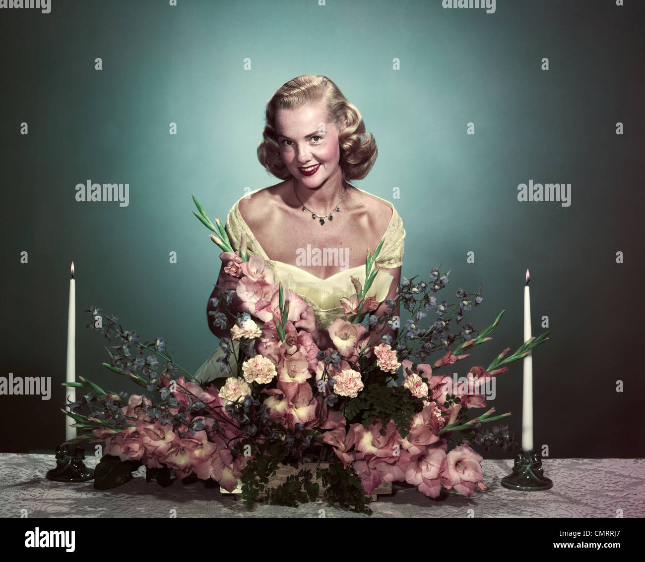 Women with flowers 1950s hi-res stock photography and images - Alamy