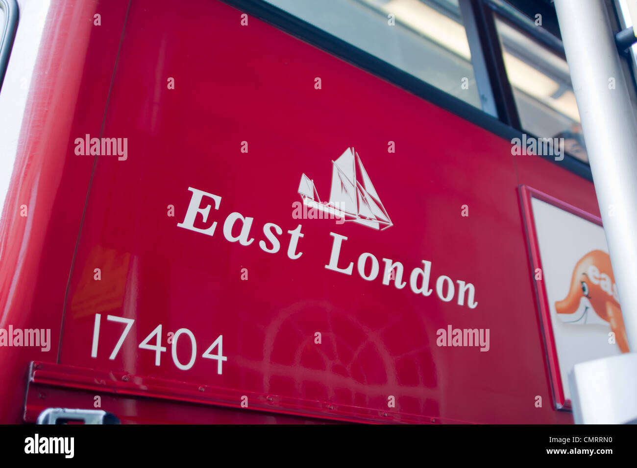 An 'East London' sign on a red London bus Stock Photo - Alamy