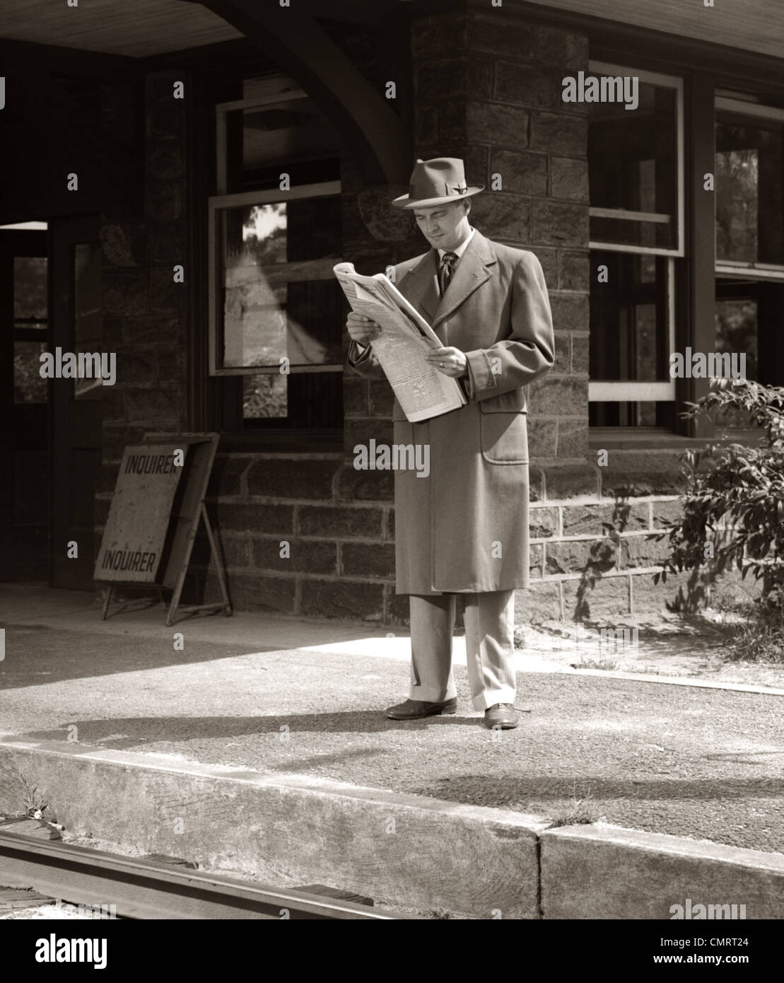 Reading newspaper train 1950s High Resolution Stock Photography and ...