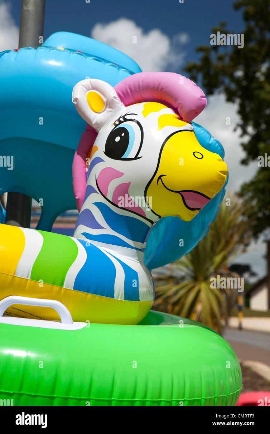 UK, England, Devon, Torquay, Goodrington Sands, colourful inflatable ...