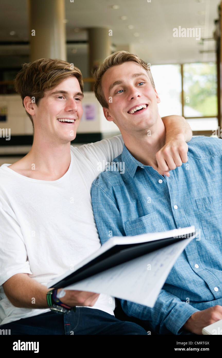 Two happy classmates Stock Photo - Alamy