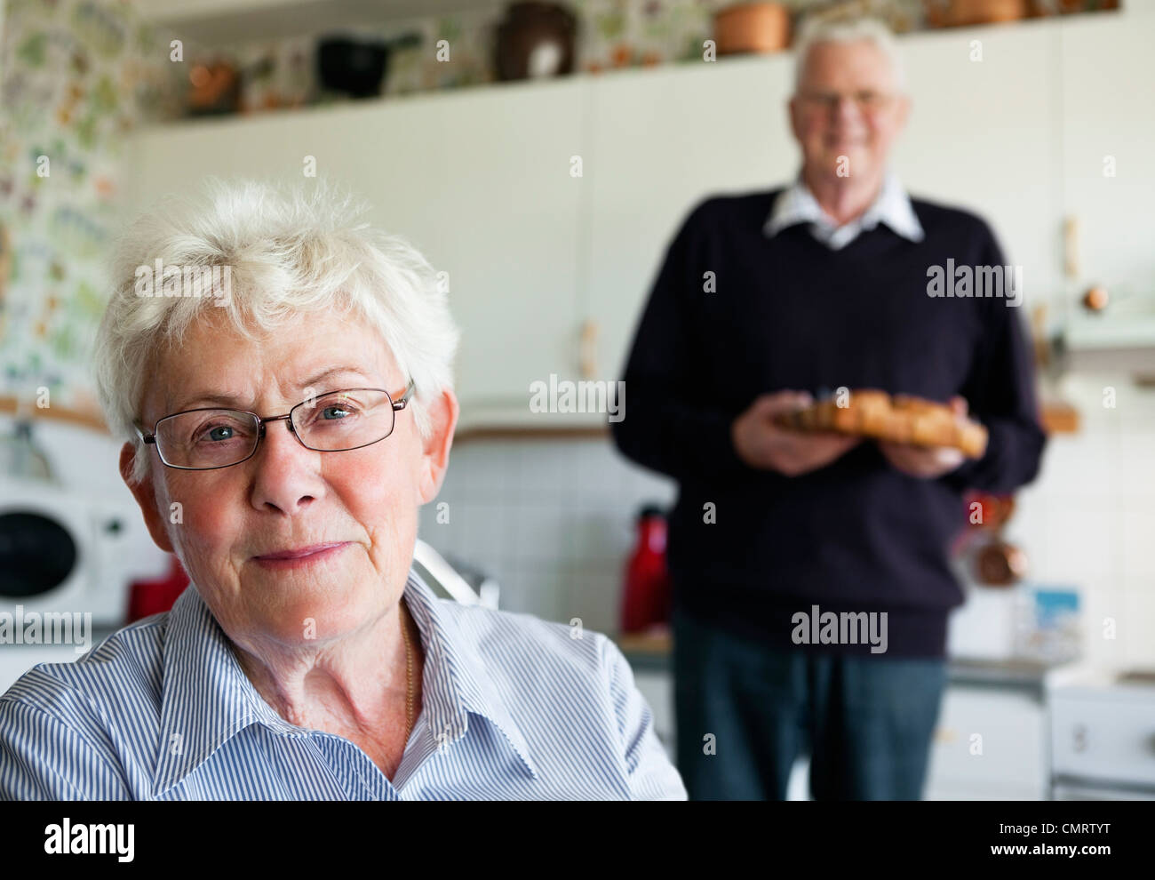 Seniors at home Stock Photo - Alamy