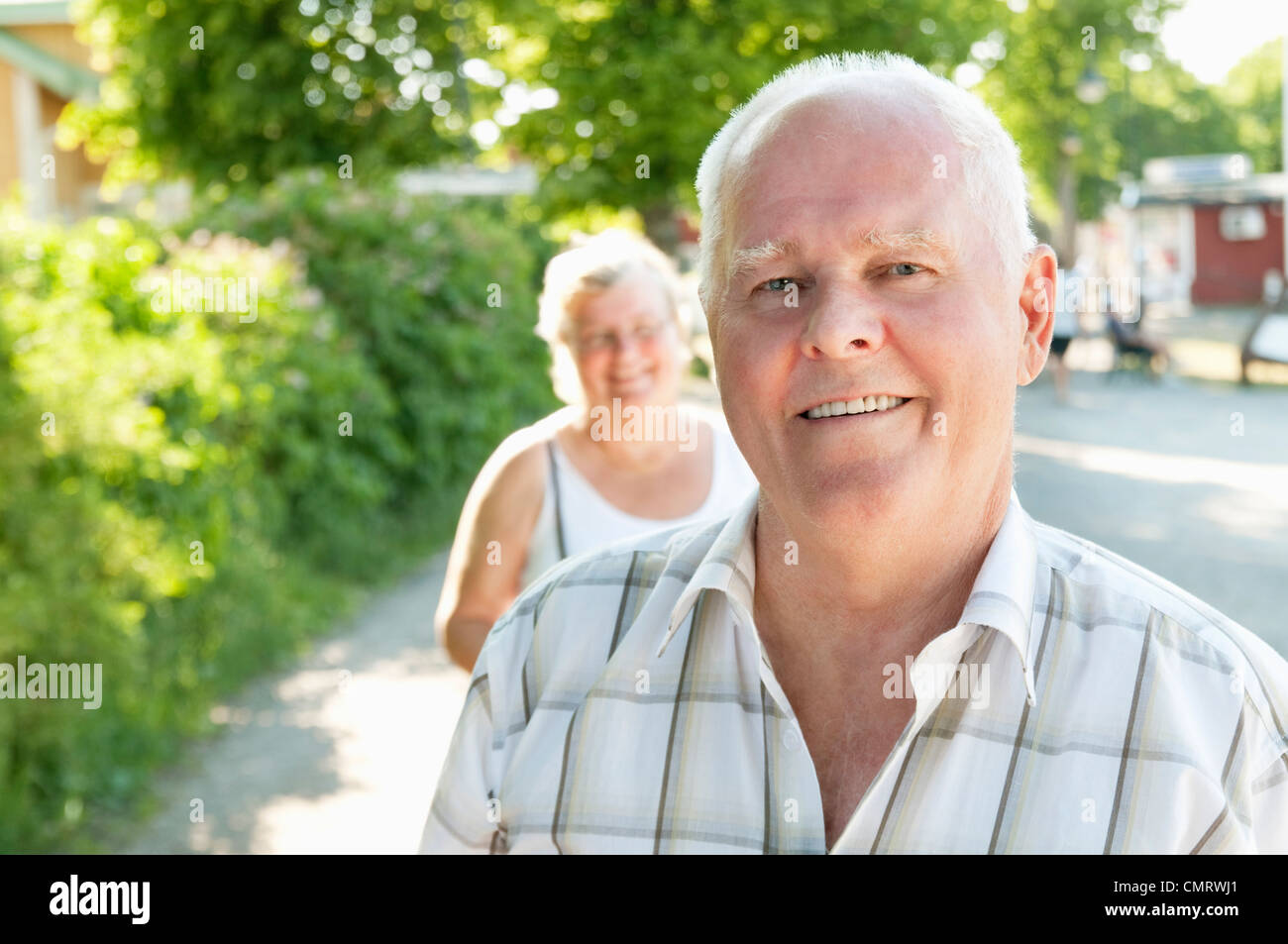 Two people on a street Stock Photo - Alamy