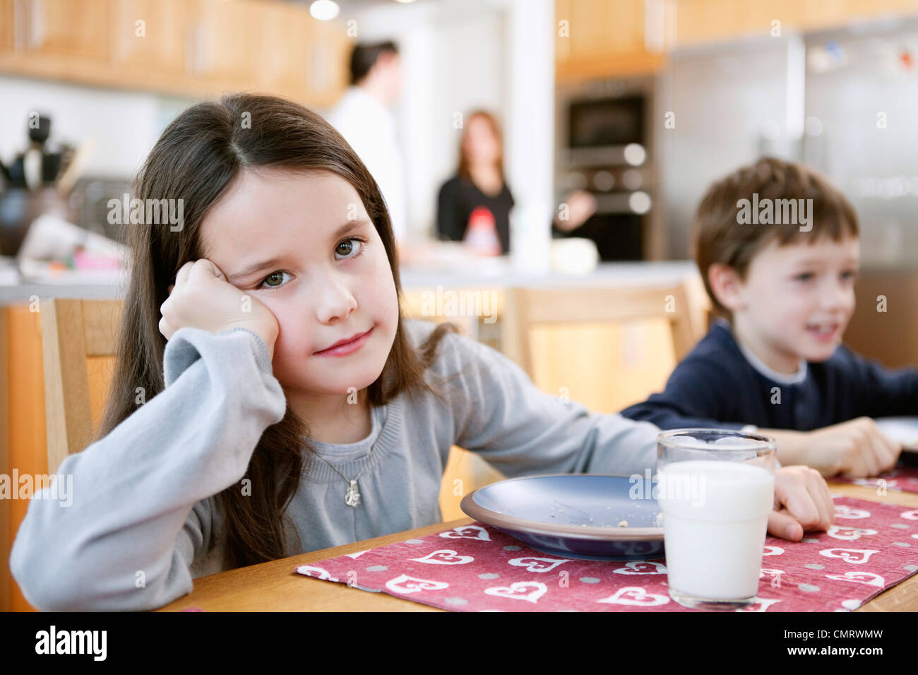 Sister and brother in kitchen Stock Photo - Alamy