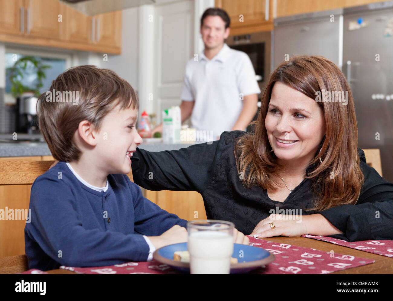 Family in the morning Stock Photo - Alamy