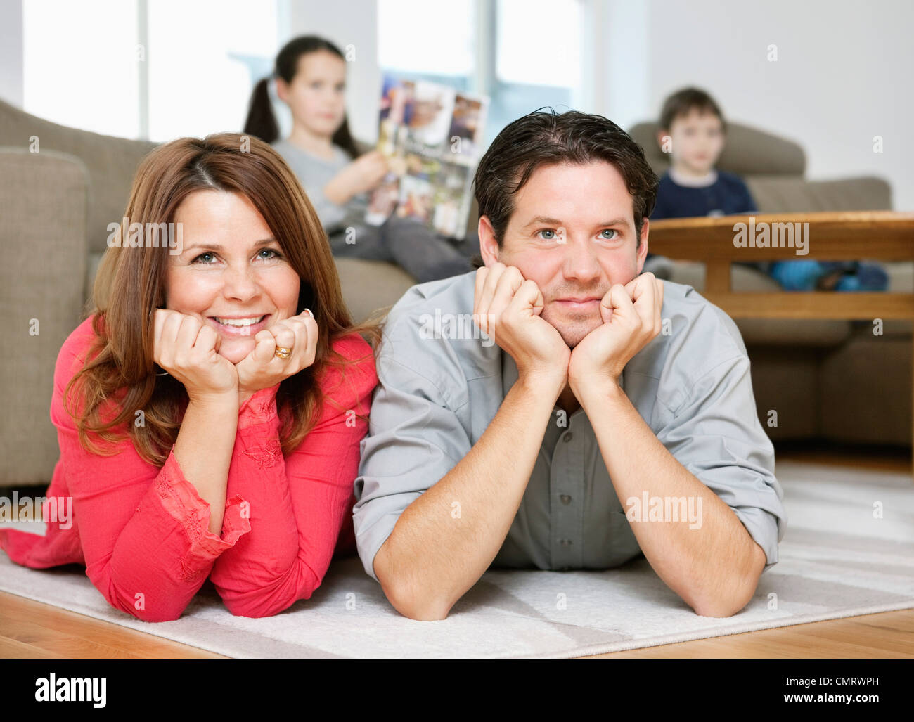 Parents watching tv Stock Photo - Alamy