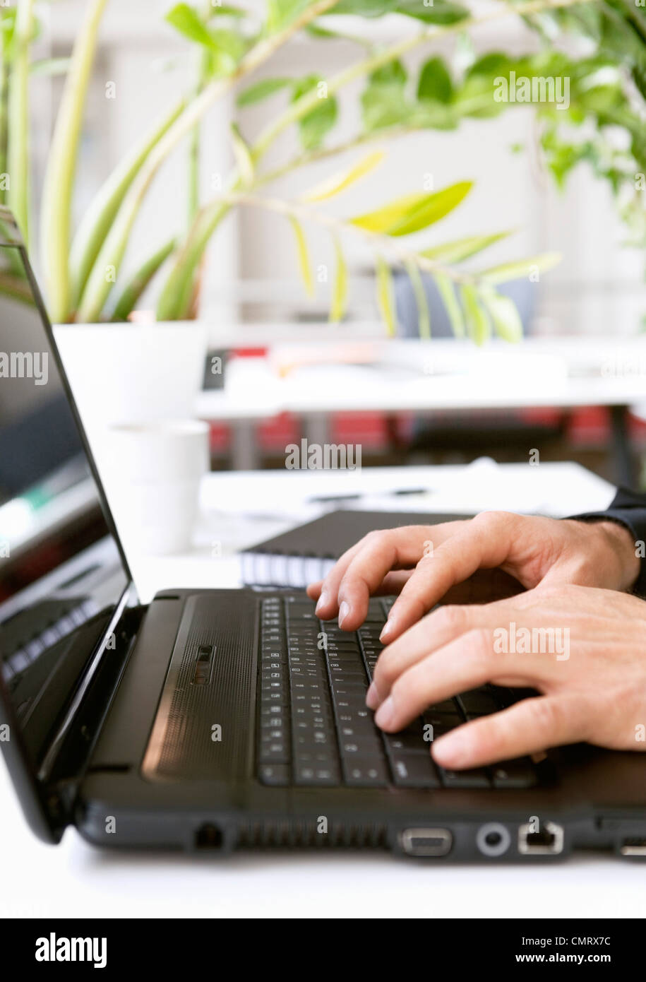 Closeup on typing hands Stock Photo - Alamy