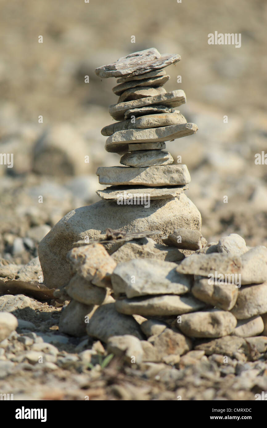 Zen stones on a desert ground Stock Photo - Alamy