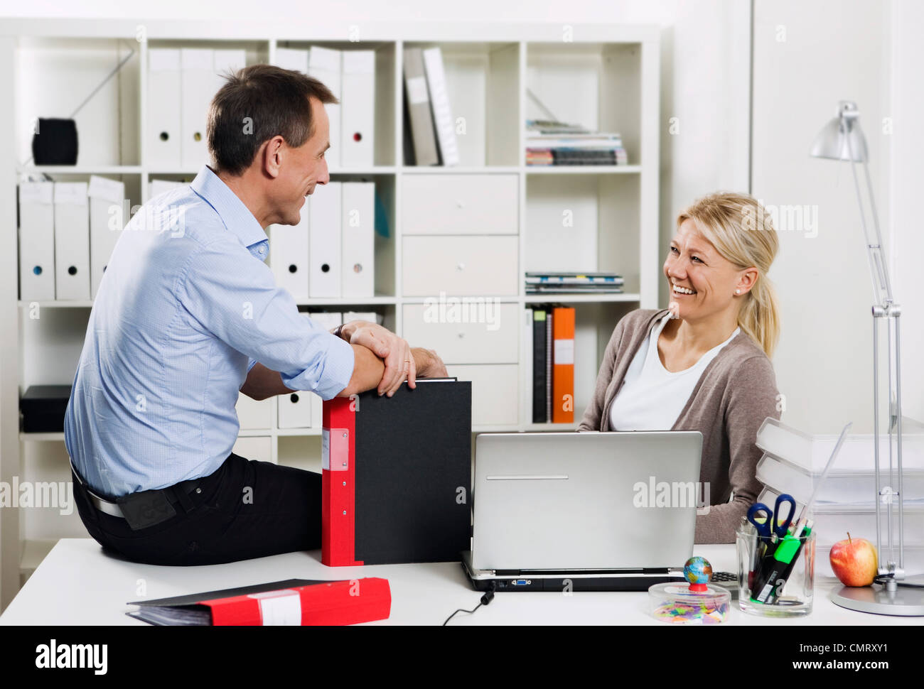 Two colleagues at work Stock Photo - Alamy