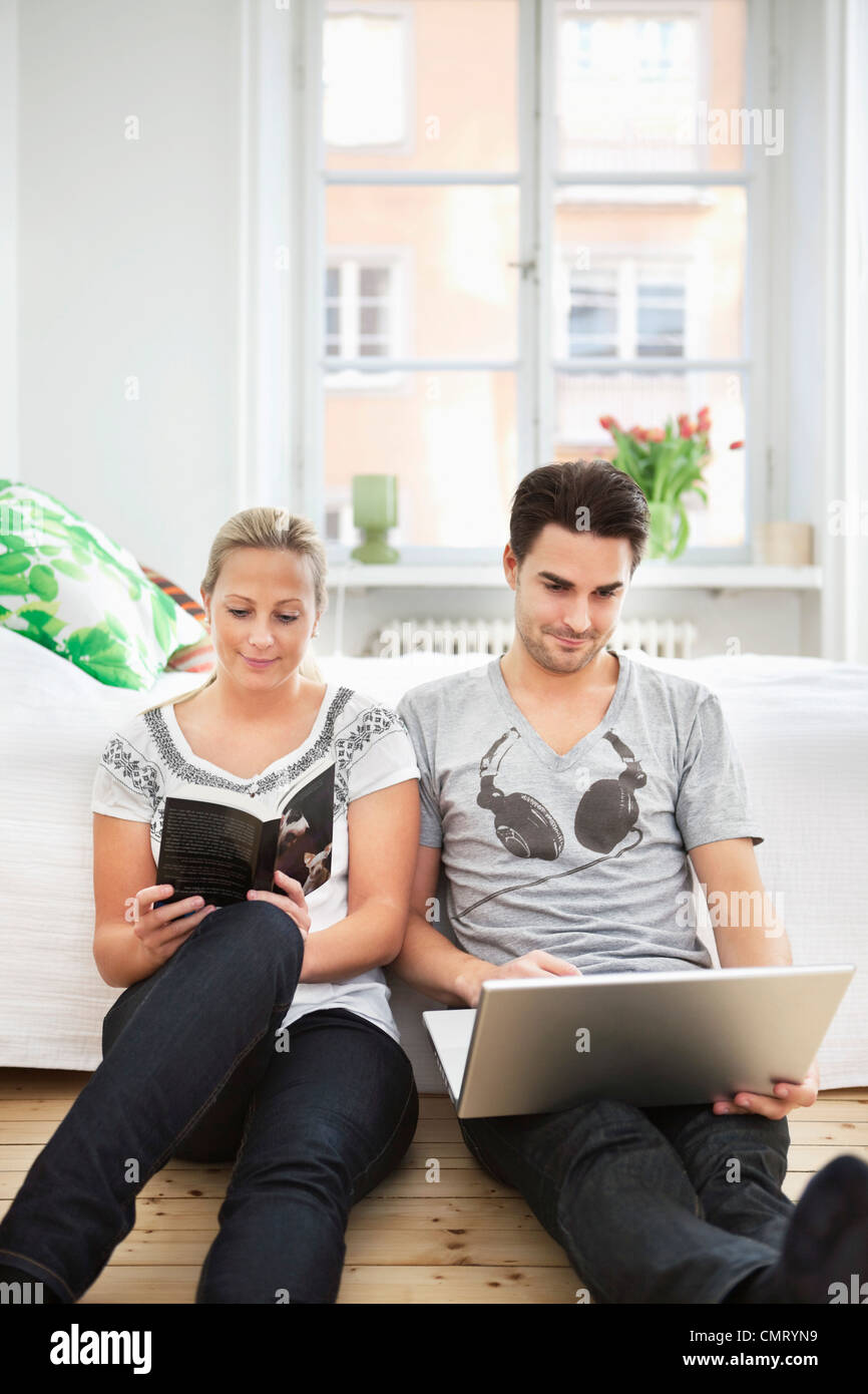 Couple in apartment Stock Photo - Alamy