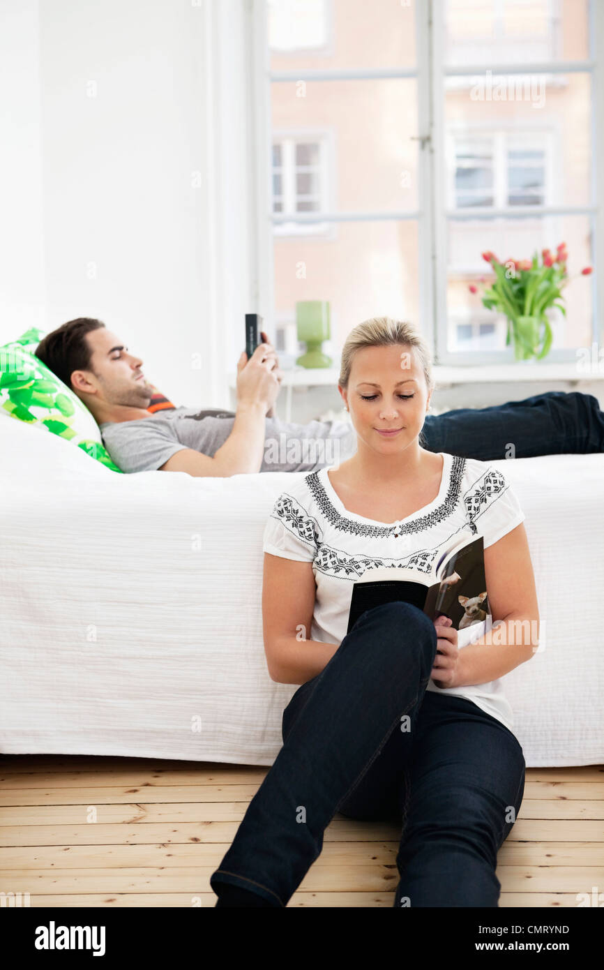 Man and woman in bedroom Stock Photo - Alamy