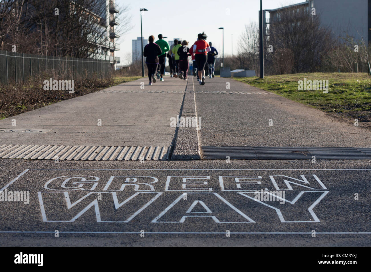 Greenway sign and path, for bikes, walking and jogging. View down path ...