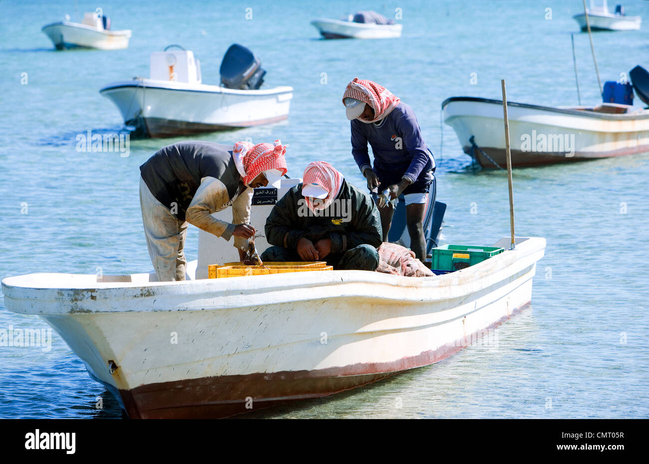 Bahrain, fishermen near the Askar village in the south of the island ...