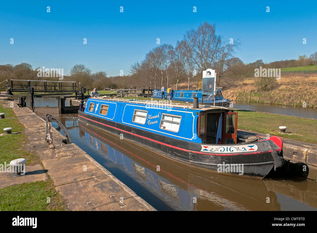 Canal narrowboat at Dean lock at Gathurst on the Leeds Liverpool canal ...
