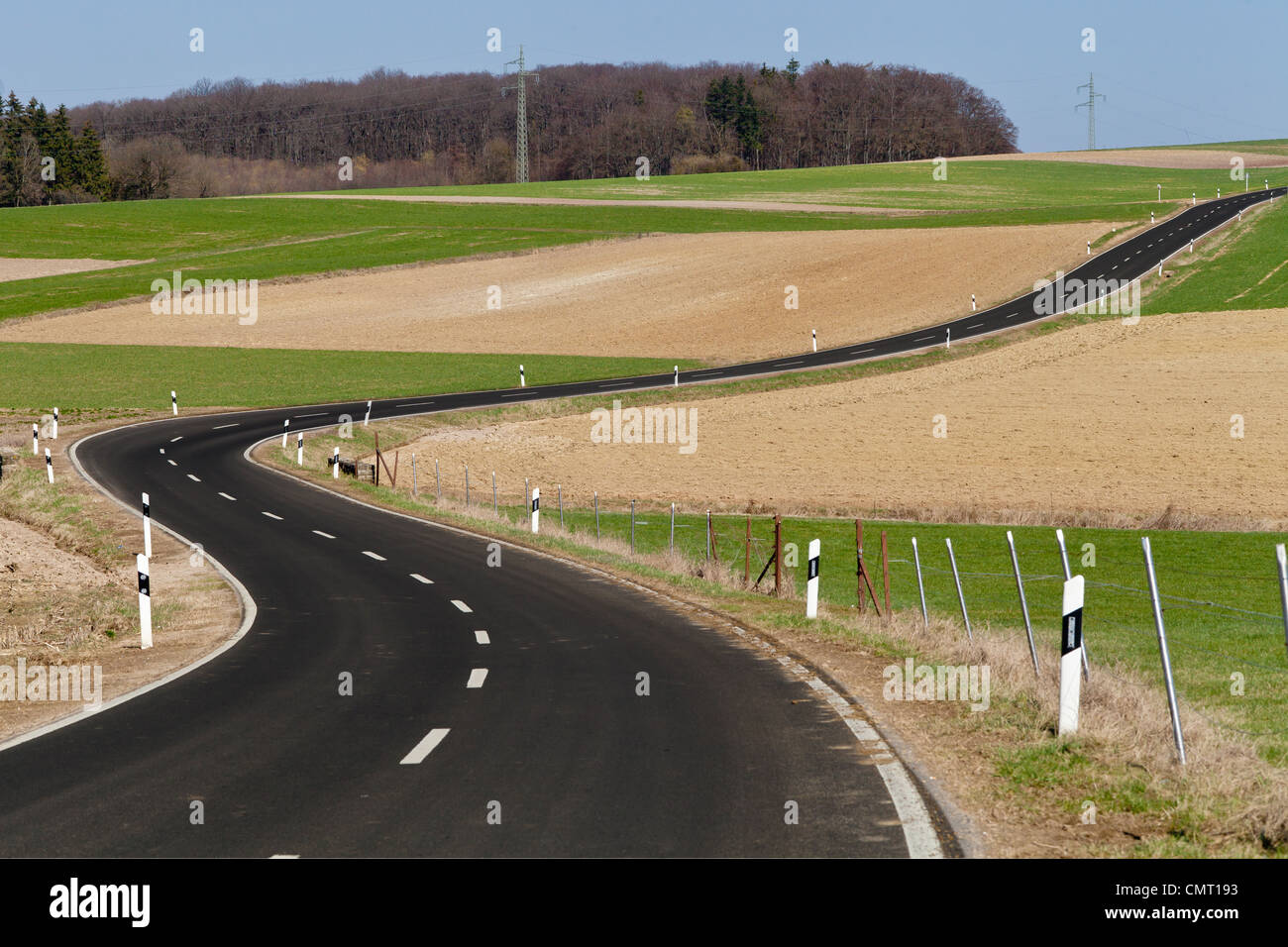 Long road in the countryside Stock Photo - Alamy