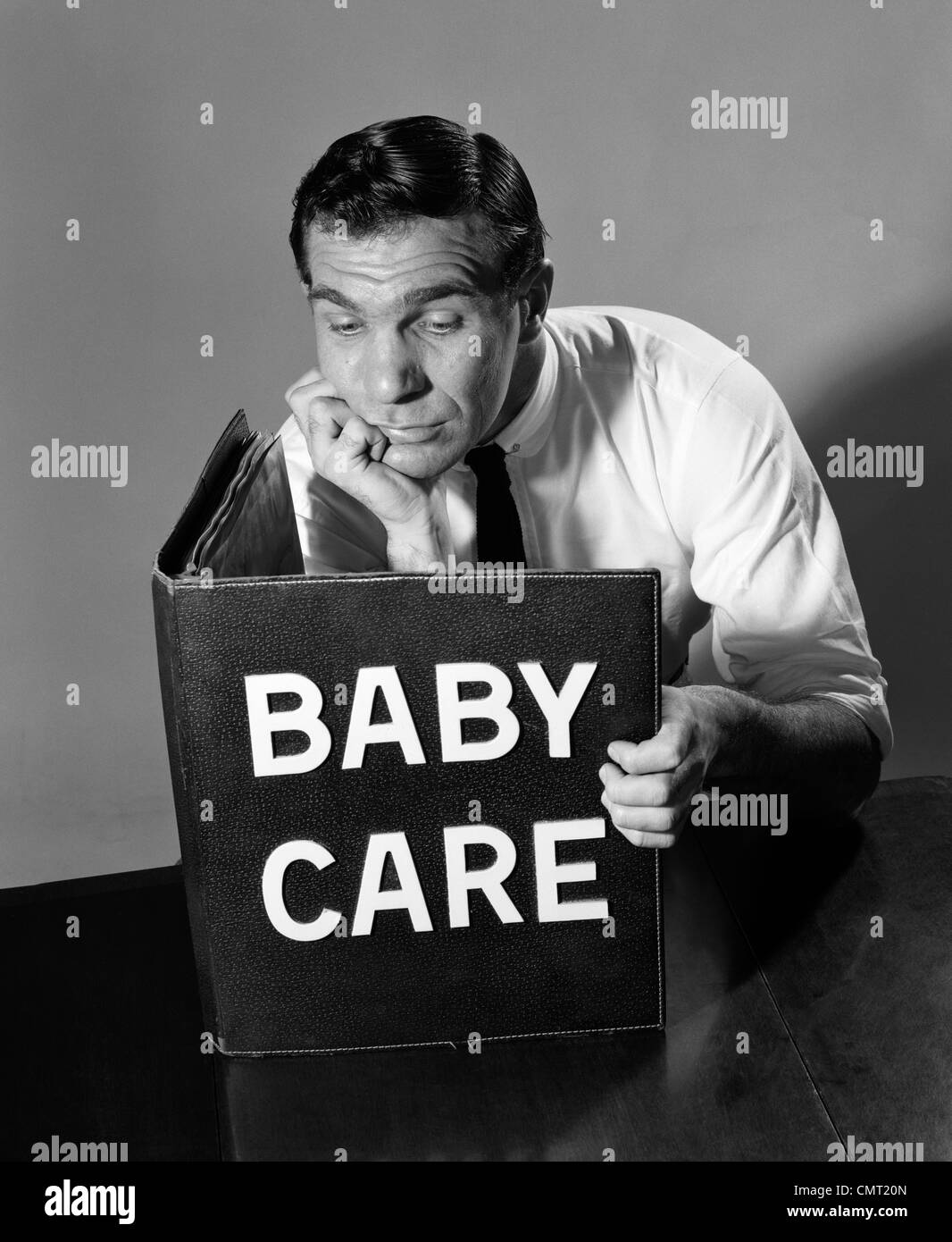 Reading with dad Black and White Stock Photos & Images - Alamy