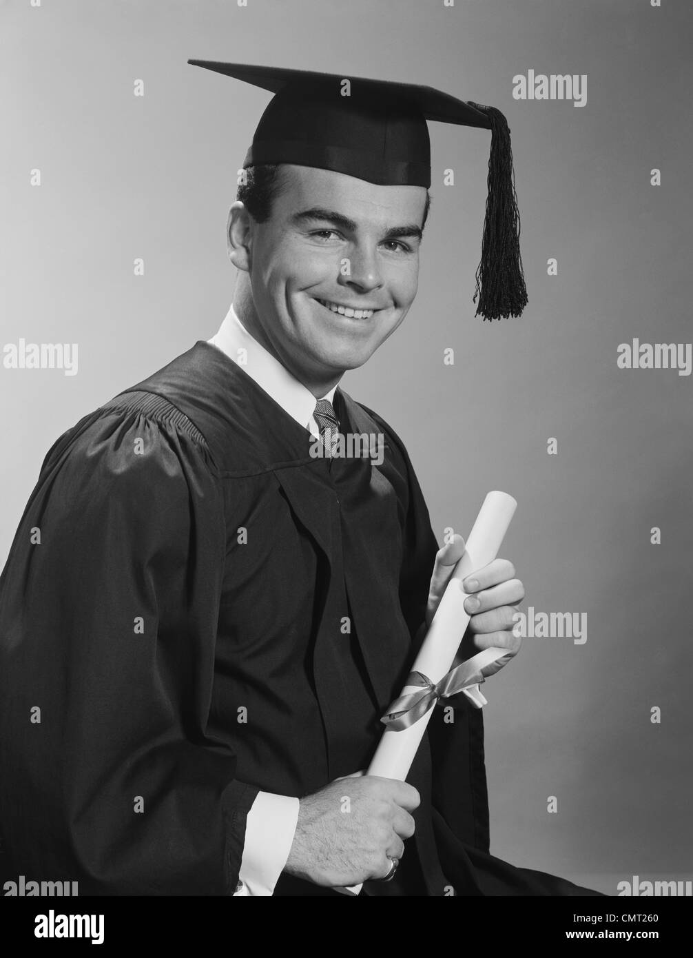 Young man happy graduation Black and White Stock Photos & Images - Alamy