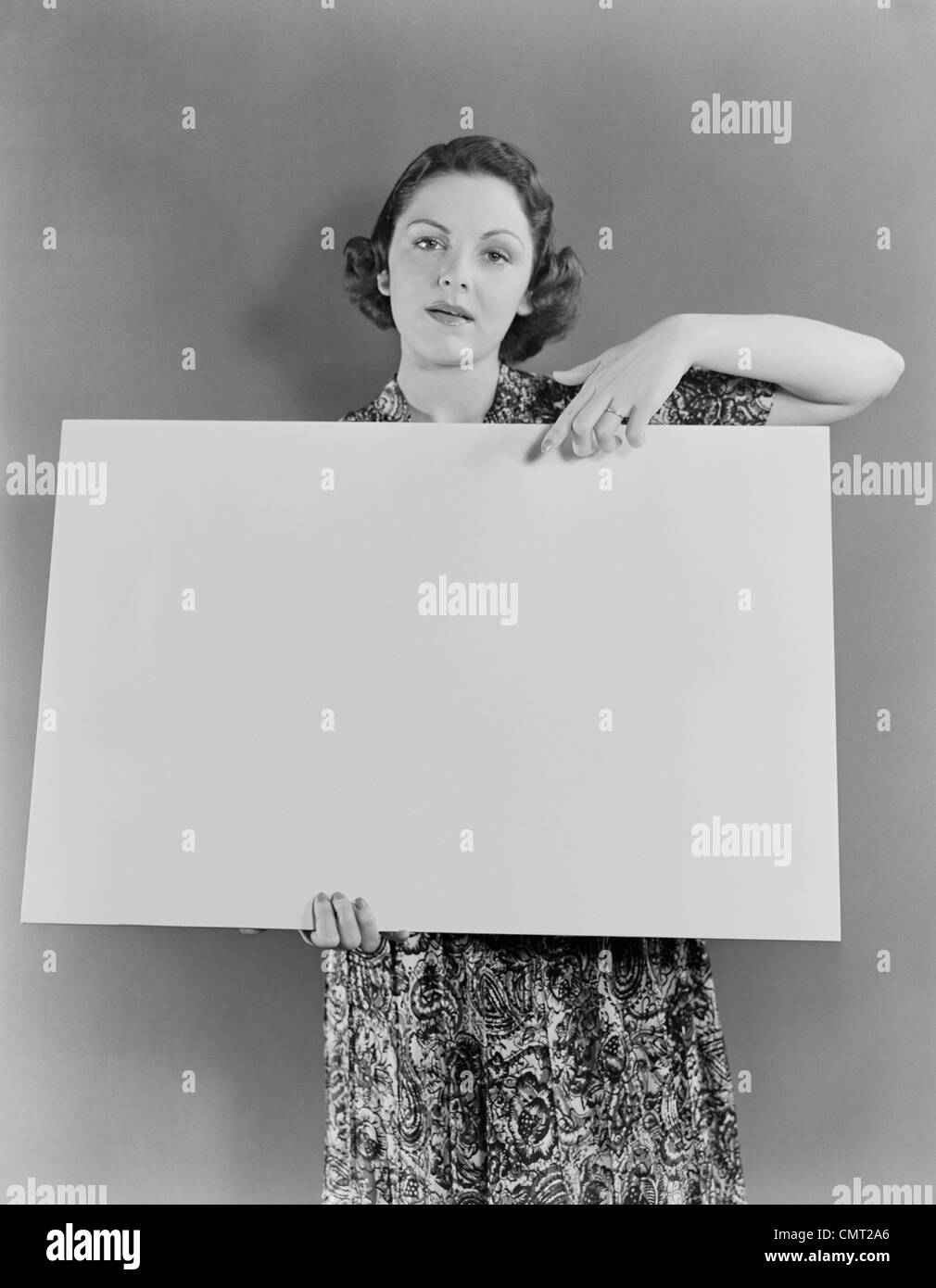 Young women hand hold eye Black and White Stock Photos & Images - Alamy