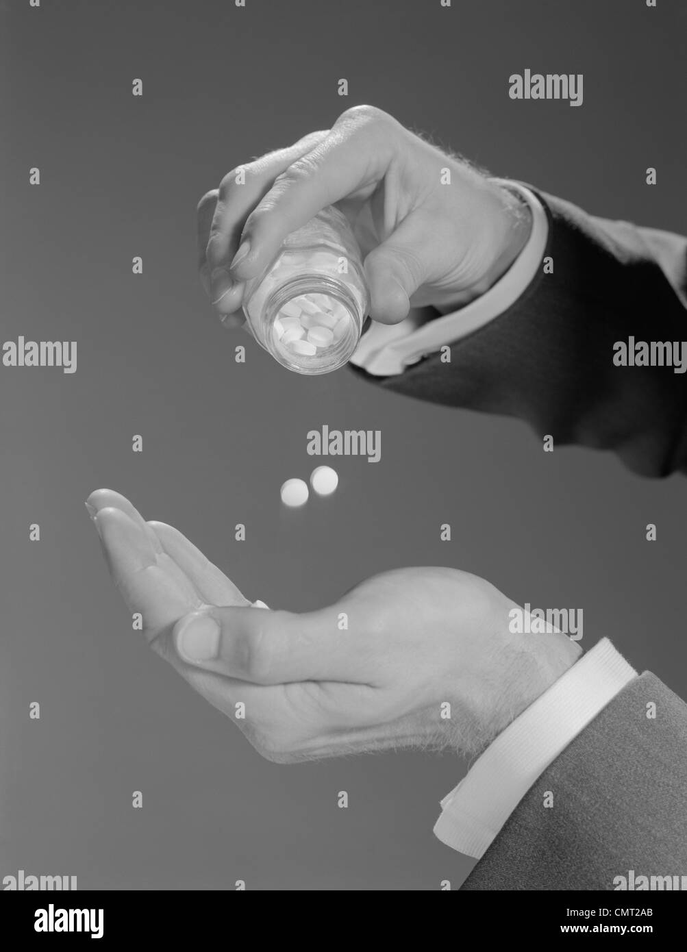 Hand shaking bottle hi-res stock photography and images - Alamy