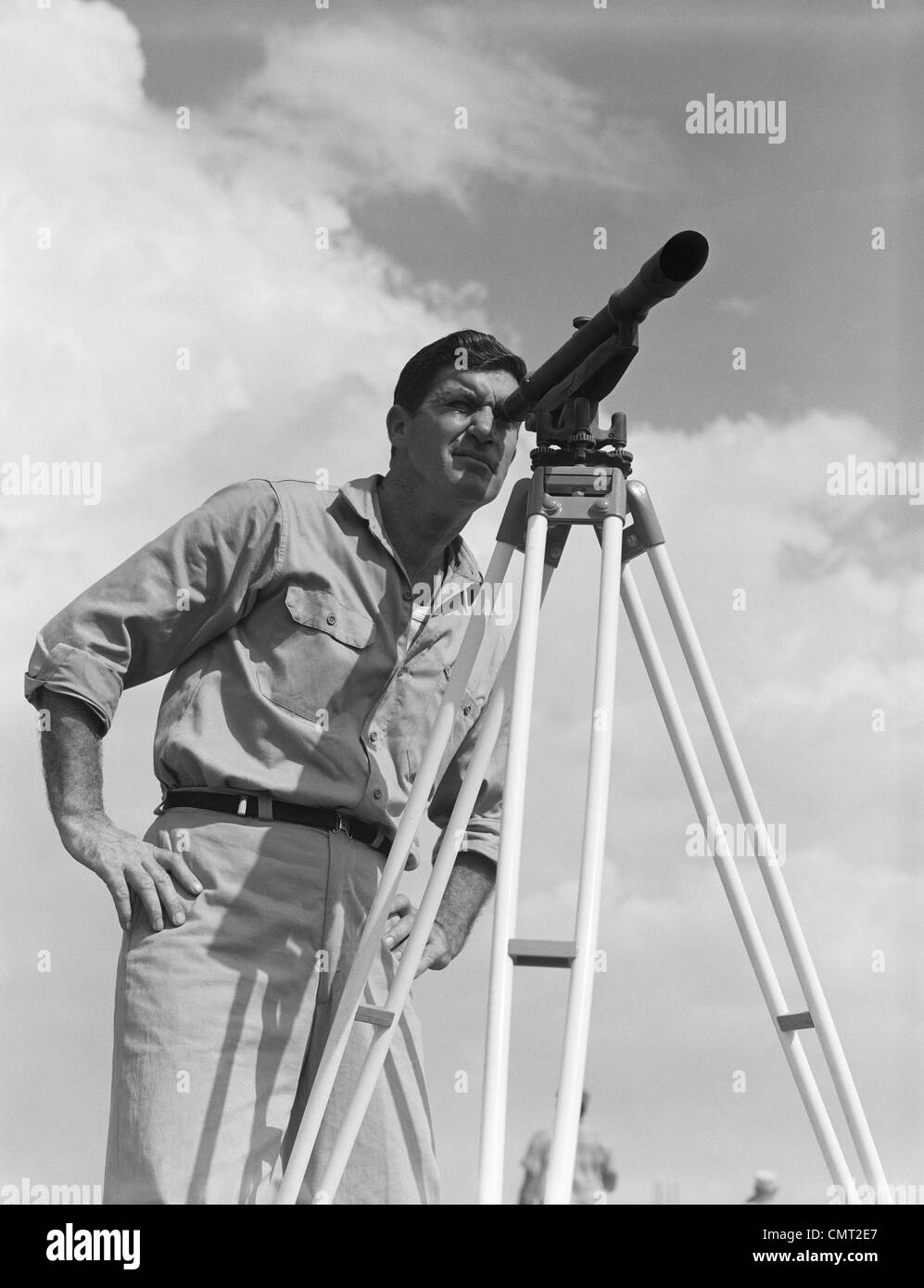 1960s man using theodolite surveying hi-res stock photography and ...
