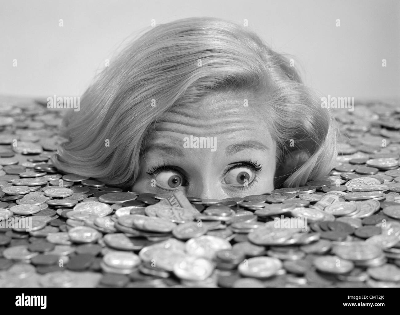 Buried coins Black and White Stock Photos & Images - Alamy