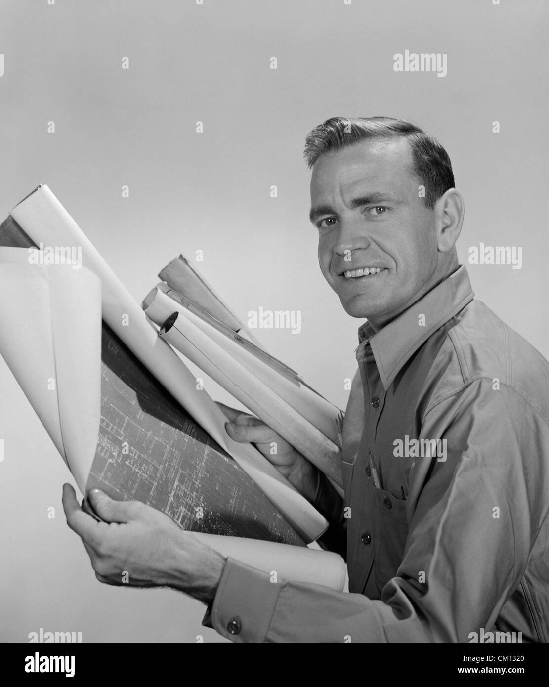 Adult man work 1950s Black and White Stock Photos & Images - Alamy