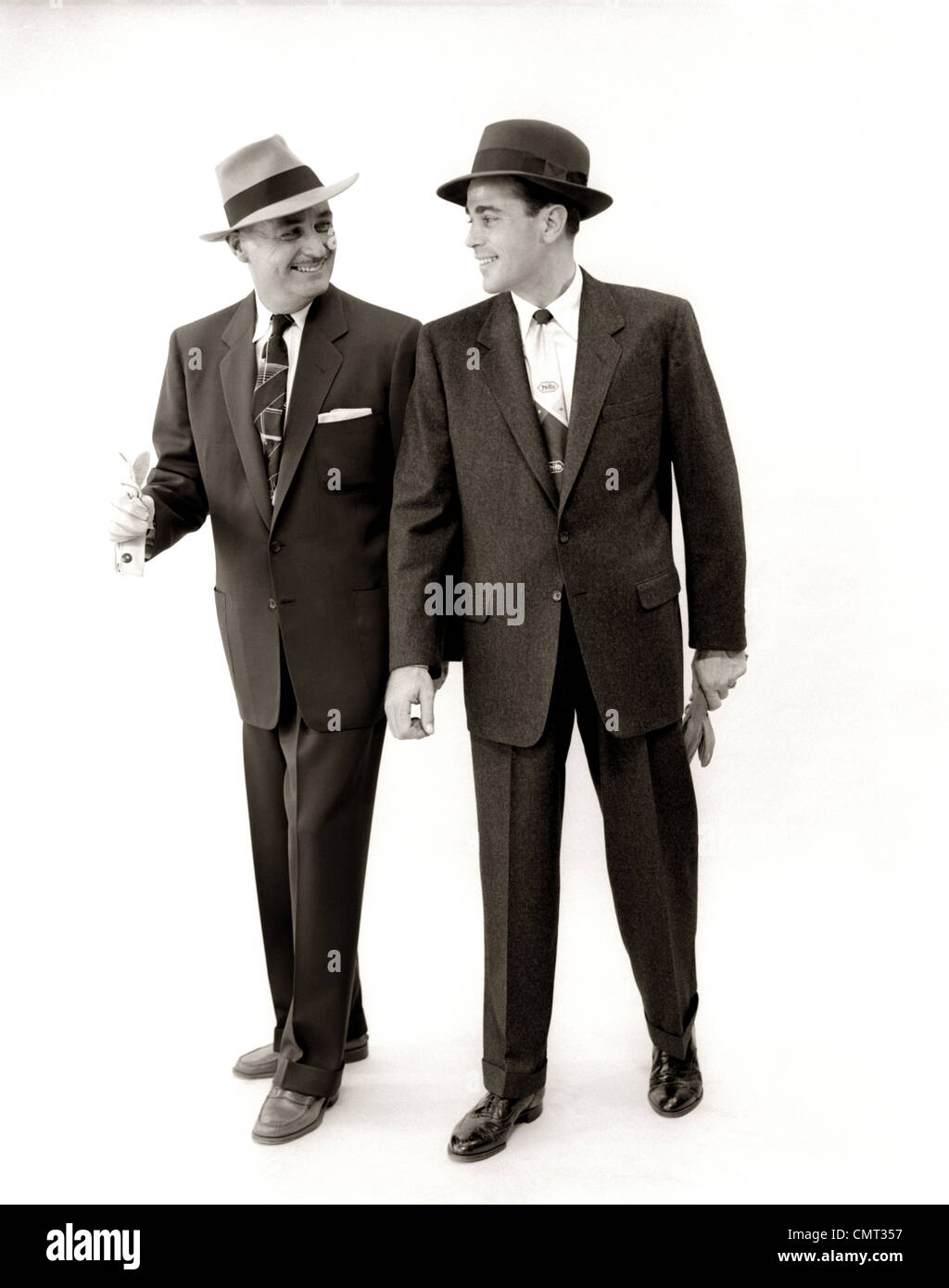 1950s TWO MEN SALESMAN BUSINESSMAN BUSINESS SUIT TIE HAT SMILING ...