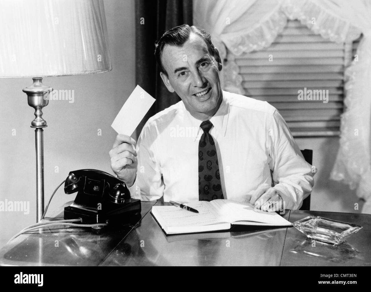 Man writing at an old fashioned desk hi-res stock photography and ...
