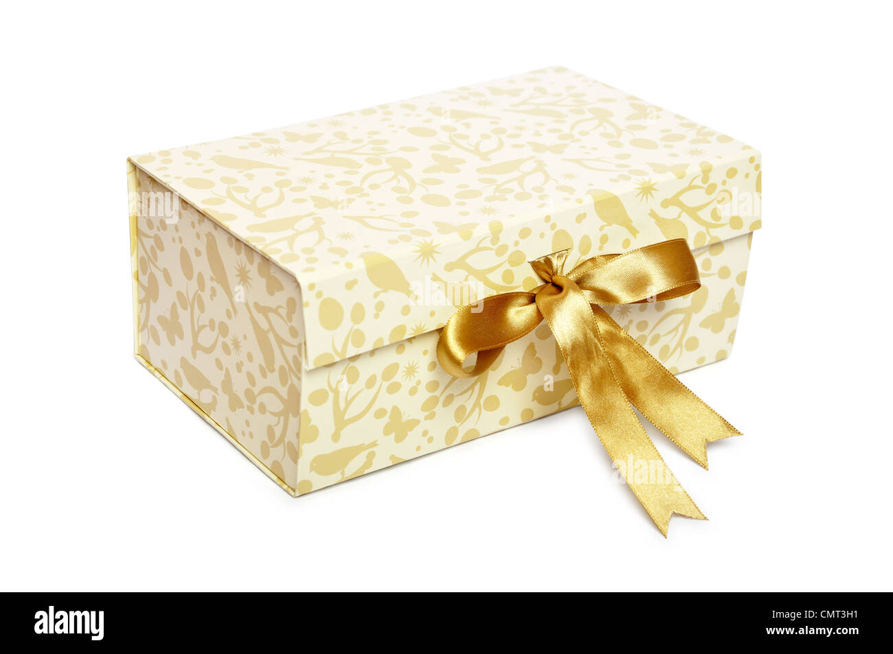 Beige gift box with golden ribbon over white background Stock Photo - Alamy