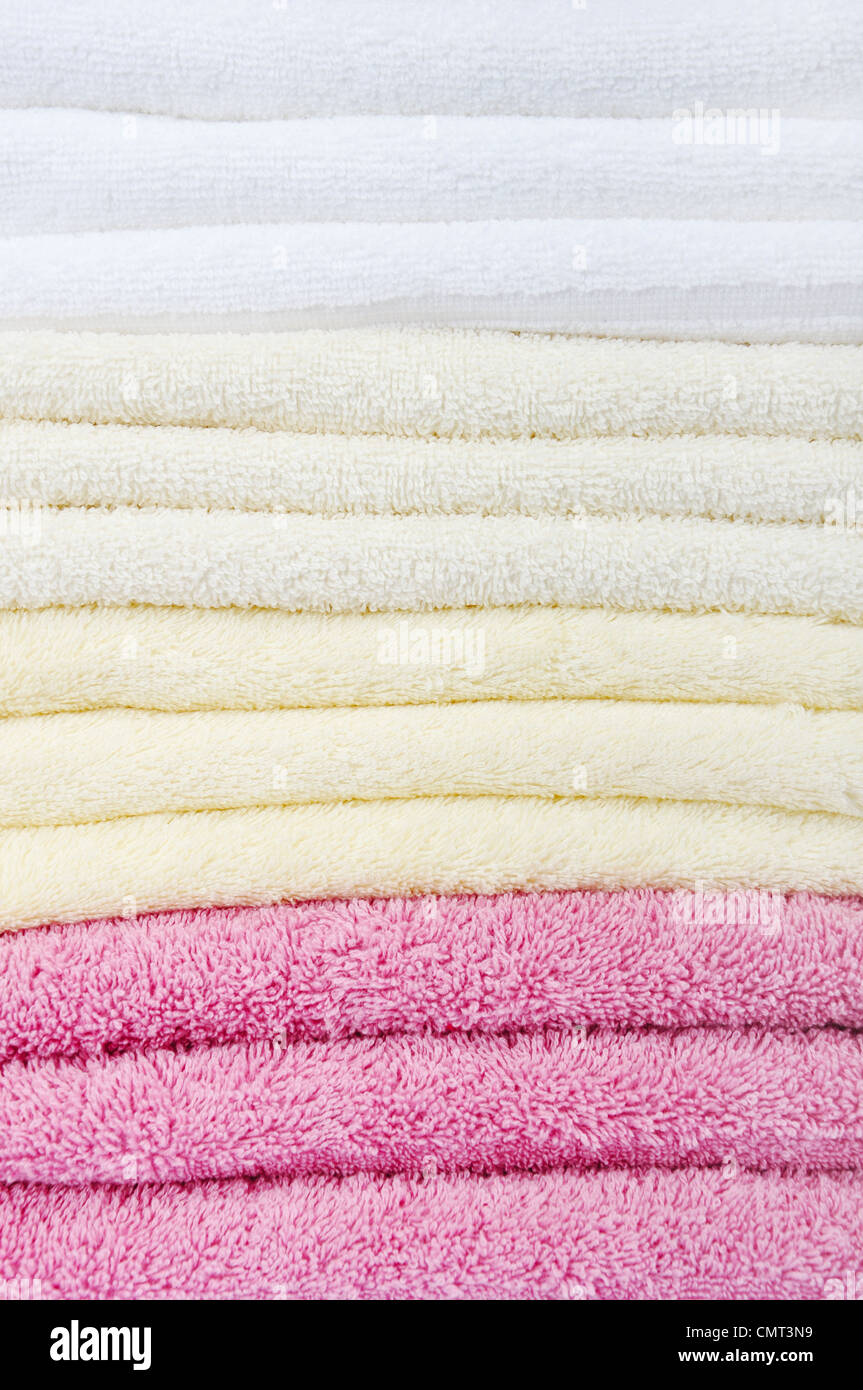 Stack of colorful towels closeup Stock Photo - Alamy