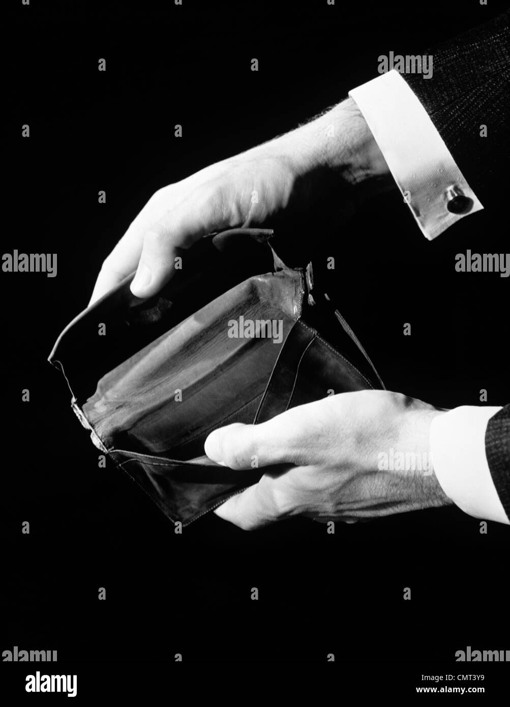 Man hand showing empty wallet Black and White Stock Photos & Images - Alamy
