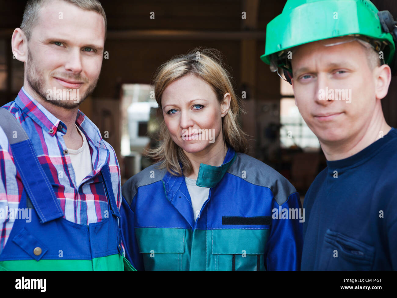 Smiling three hi-res stock photography and images - Alamy