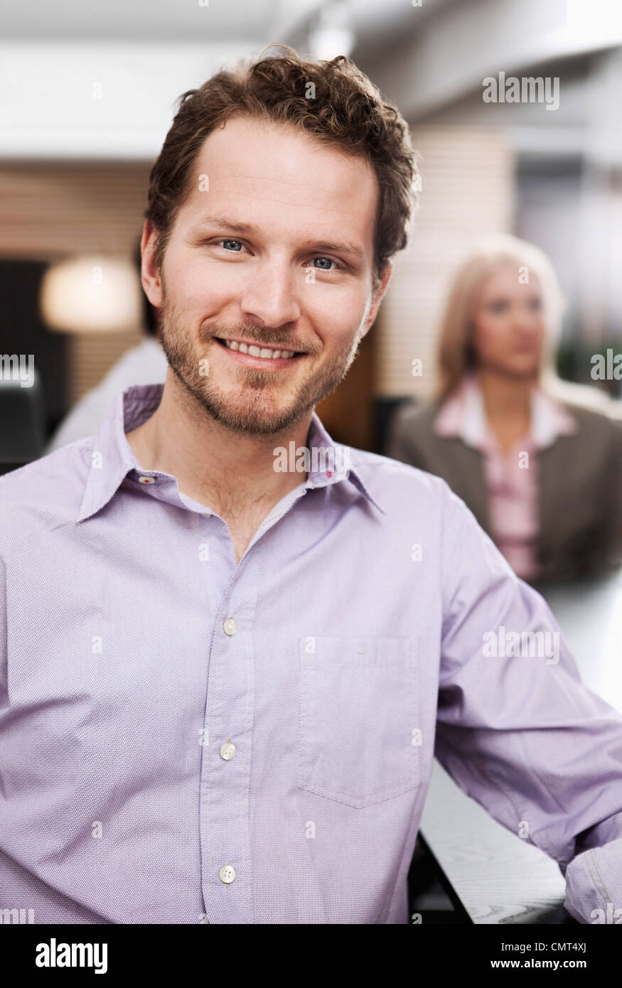 Portrait of smiling man at work Stock Photo - Alamy